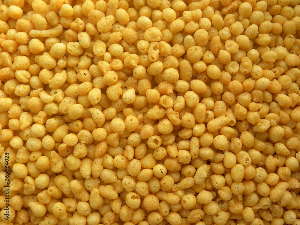 Yellow color salted fried small Boondi balls spicy Indian snack made ...