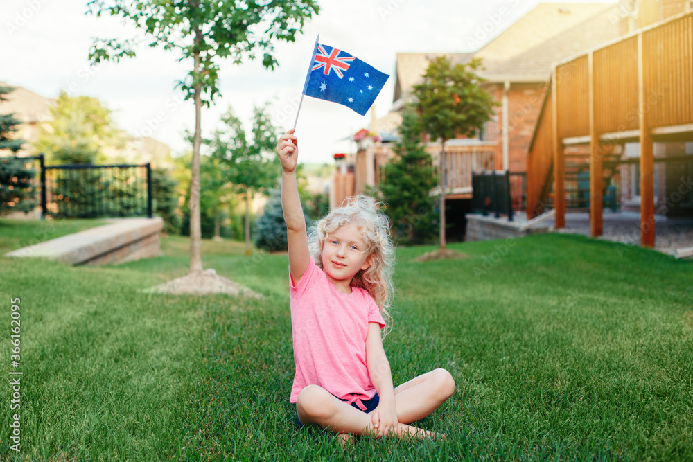 Adorable cute happy Caucasian girl holding Australian flag. Smiling ...