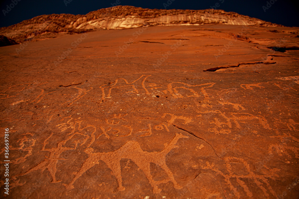 Fotografie Close up view of the prehistoric stone inscriptions and ...