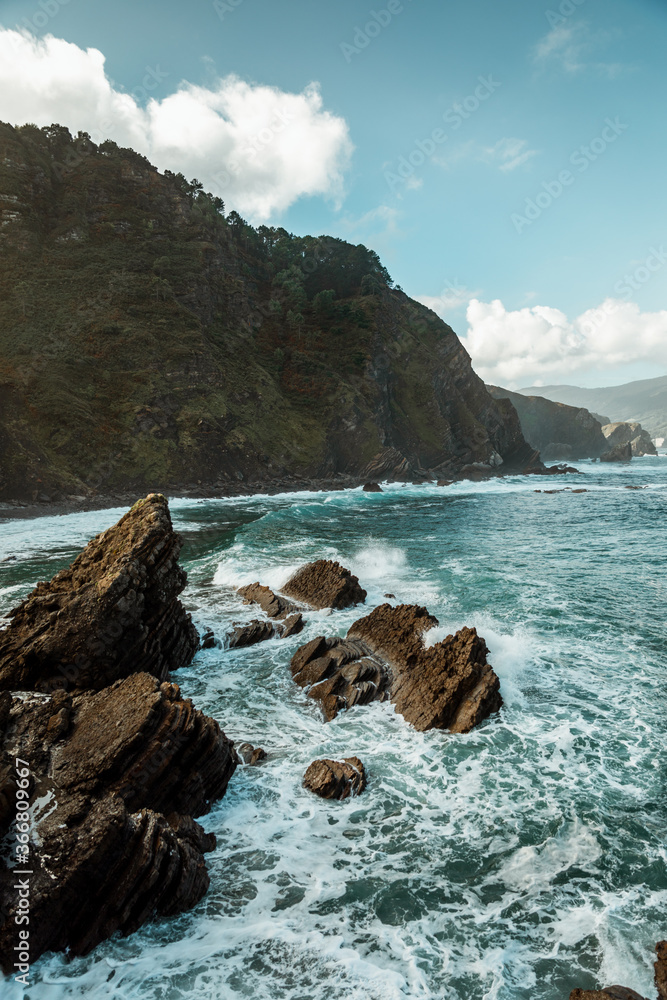 Scenery view of ocean with pure water and waves forming foam while ...