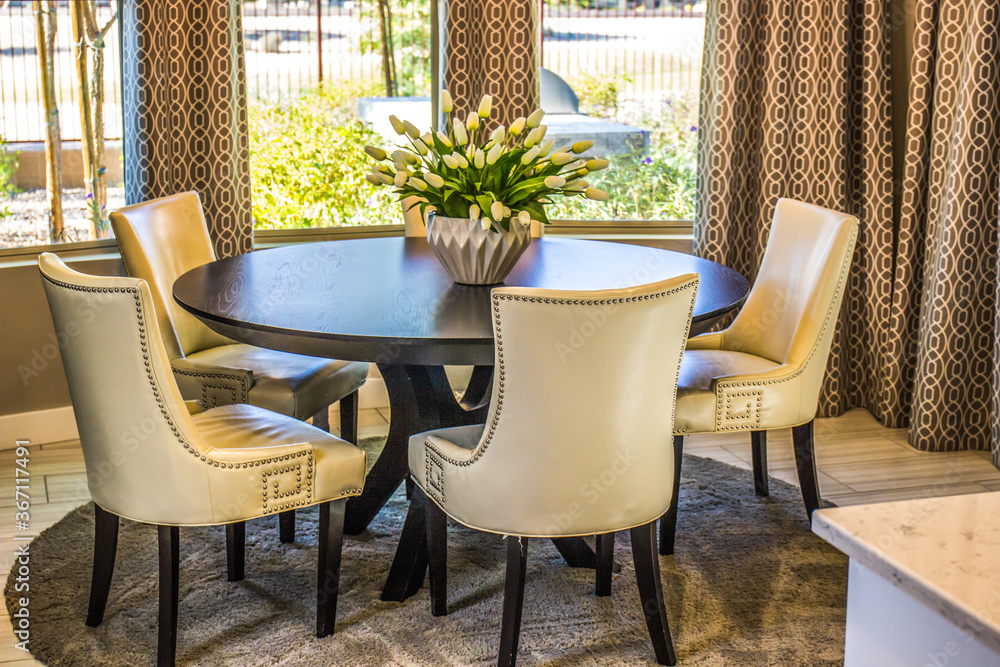 Dining Room Table & Chairs With Flower Centerpiece Stock Photo | Adobe ...