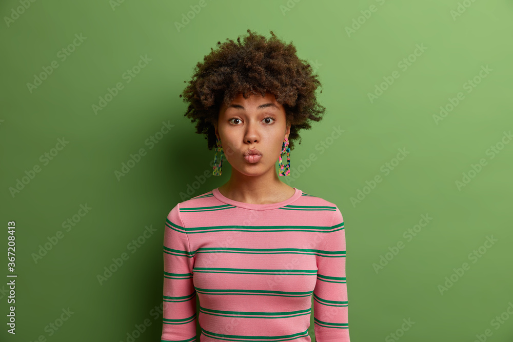 Photo Stock Human face expressions. Romantic lovely young woman keeps ...