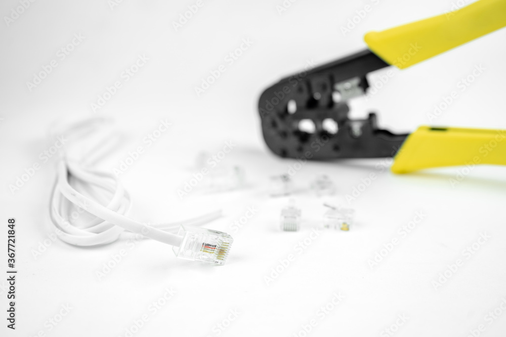 internet or telephone line cables and crimper, Twisting Cable Tool ...