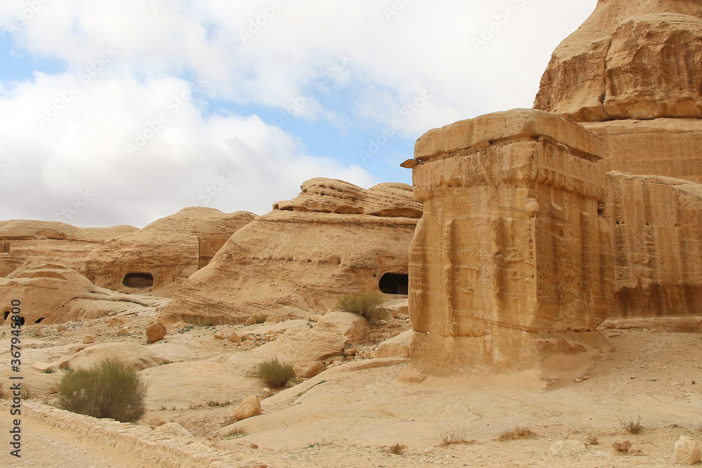 Block tombs in ancient Petra city in Jordan. This buildings are carved ...