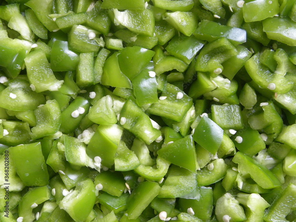 Diced cut green color raw Bell pepper Stock Photo | Adobe Stock