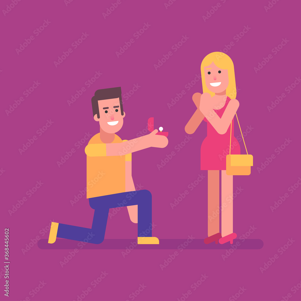 Young man standing on one knee in front of girl and gives an engagement ...