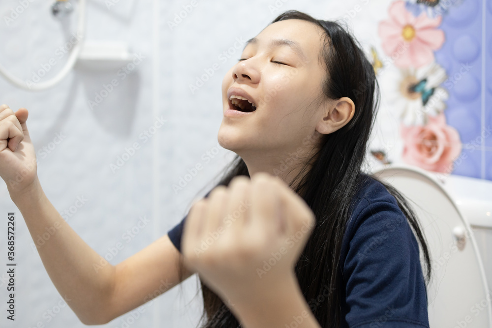 Defecation and urination,Happy asian people sitting on the toilet ...