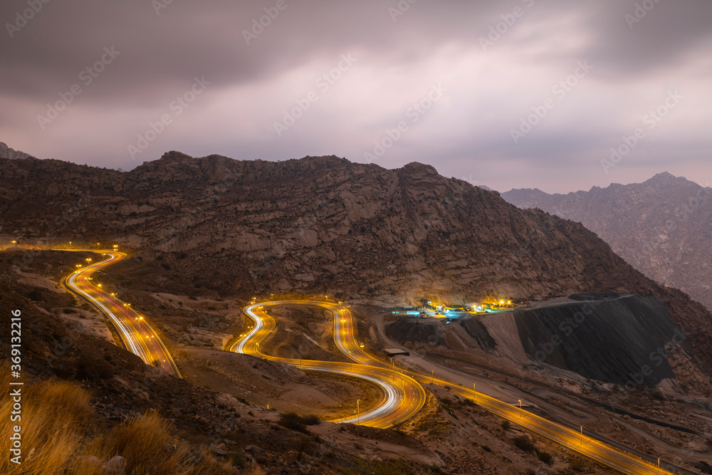 Traffic light trails along the zig zag road in Al Hada, Taif region of ...