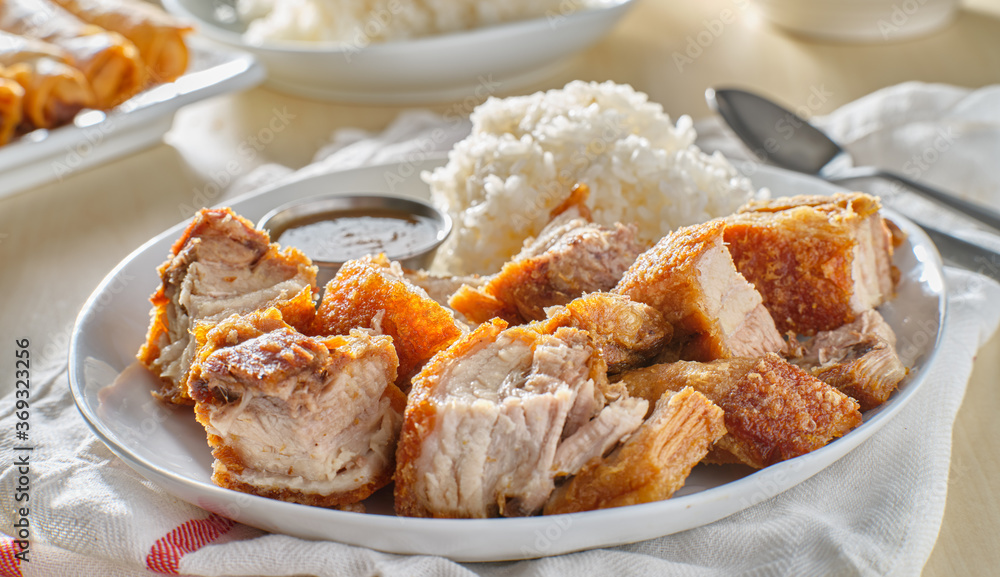 crispy filipino lechon kawali with white rice Stock Photo | Adobe Stock
