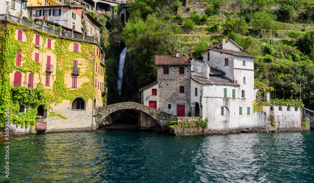 Lake Como view of the bridge Ponte della Civera and Nesso gorge and the waterfall. Nesso Italy ...