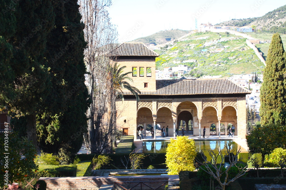 View of The Generalife courtyard, with its famous fountain and garden ...