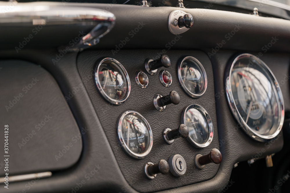 Selective focus, interior view of classic and vintage detail of gauge ...