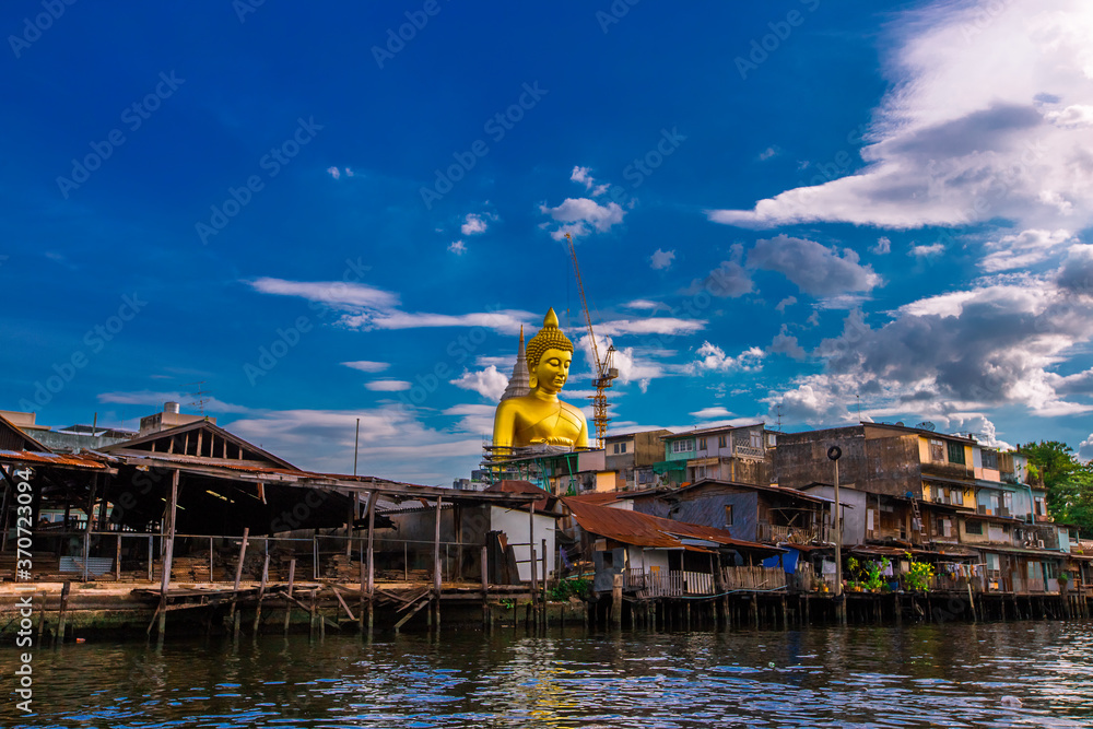 Foto de Stock Background of a large Buddha statue in Bangkok(Wat Pak ...