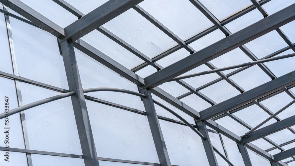 steel building framework with glazing structure on construction site of ...