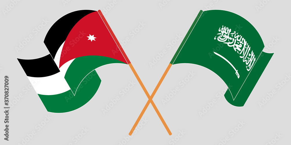 Crossed and waving flags of Jordan and the Kingdom of Saudi Arabia ...