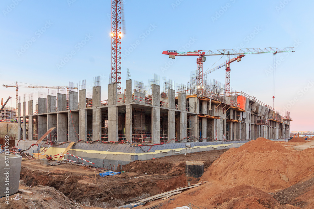 Reinforcement work and installation of formwork. Concrete is poured in ...
