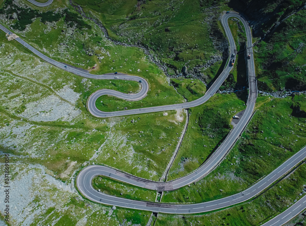 Above view of epic winding road on Transfagarasan pass in Romania in ...