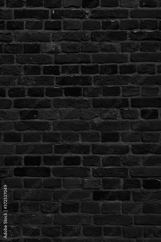 Black brick building wall. Interior of a modern loft. Background for ...