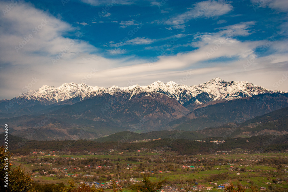 The snow peaks of Himalayas/ The Dhauladhar range, is part of a lesser ...