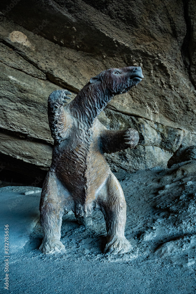 Replica of an extinct ground sloth on the entrance of the Cueva del ...