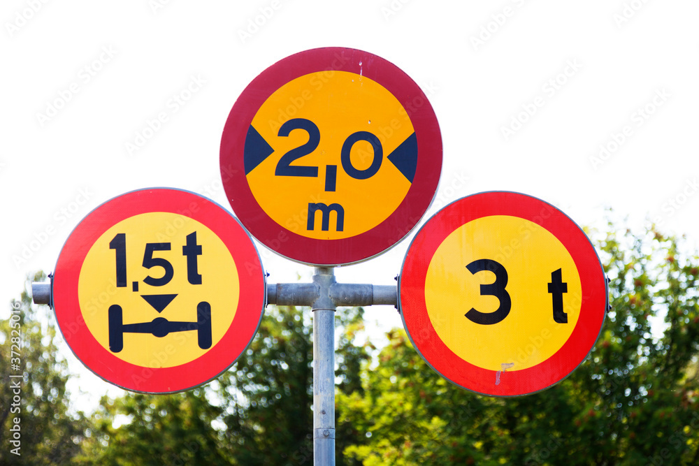 road signs at the bridge that describe the thickness, height and width ...