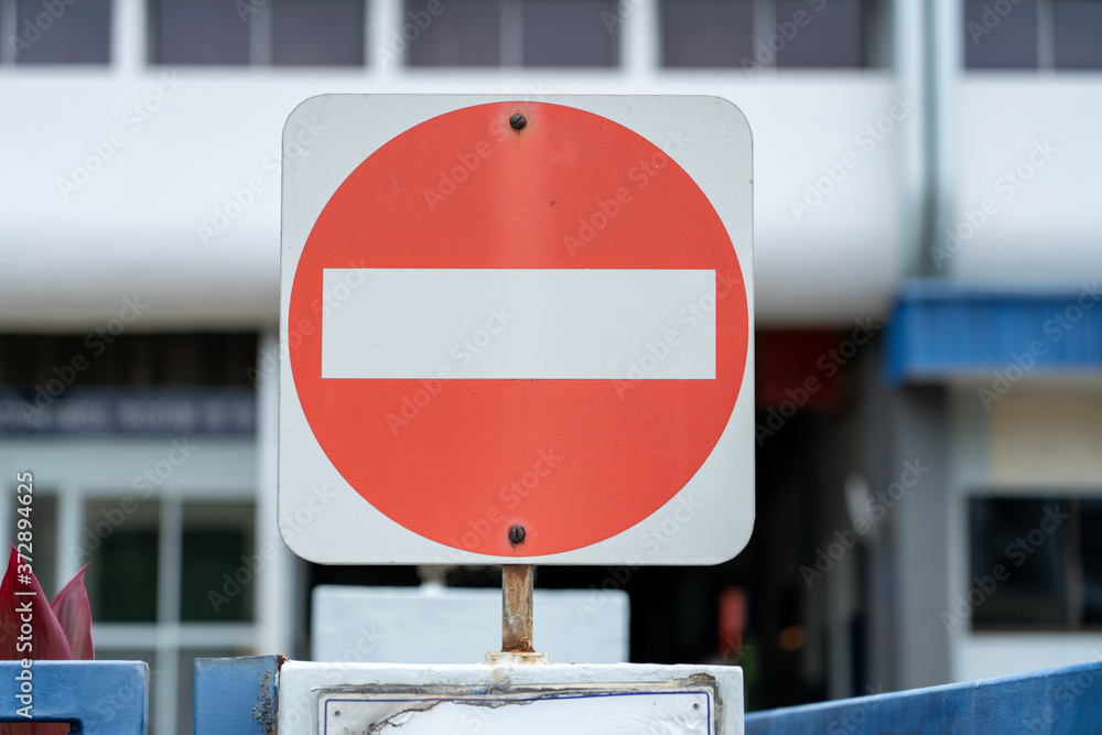 Round red no entry traffic sign in a street Stock Photo | Adobe Stock