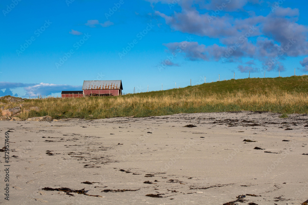Barn on a beach in North norway beach barn grass blue sky Stock Photo ...