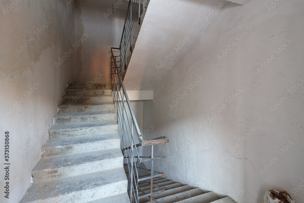 Corridor of new residential building under construction view. Aerated ...