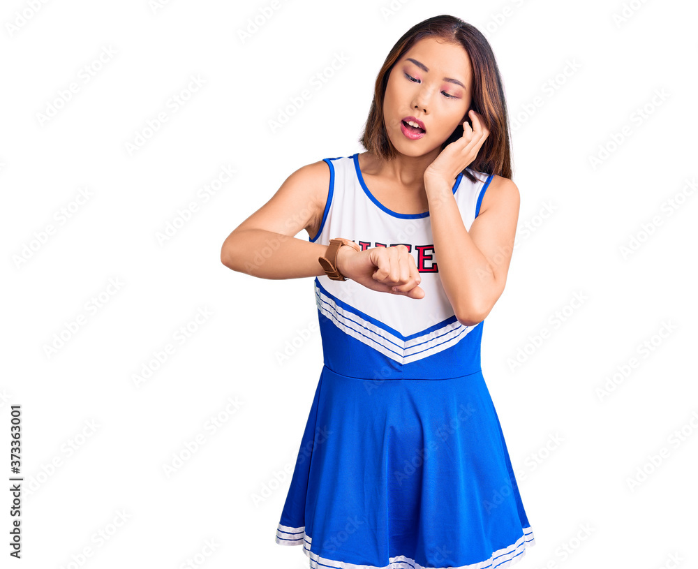 Young Beautiful Chinese Girl Wearing Cheerleader Uniform Looking At The 5174
