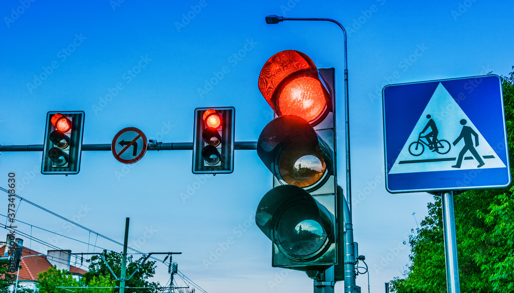 Traffic lights over urban intersection Stock Photo | Adobe Stock
