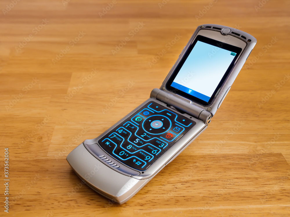 Retro flip phone cell phone. Vintage old fashioned push button mobile ...