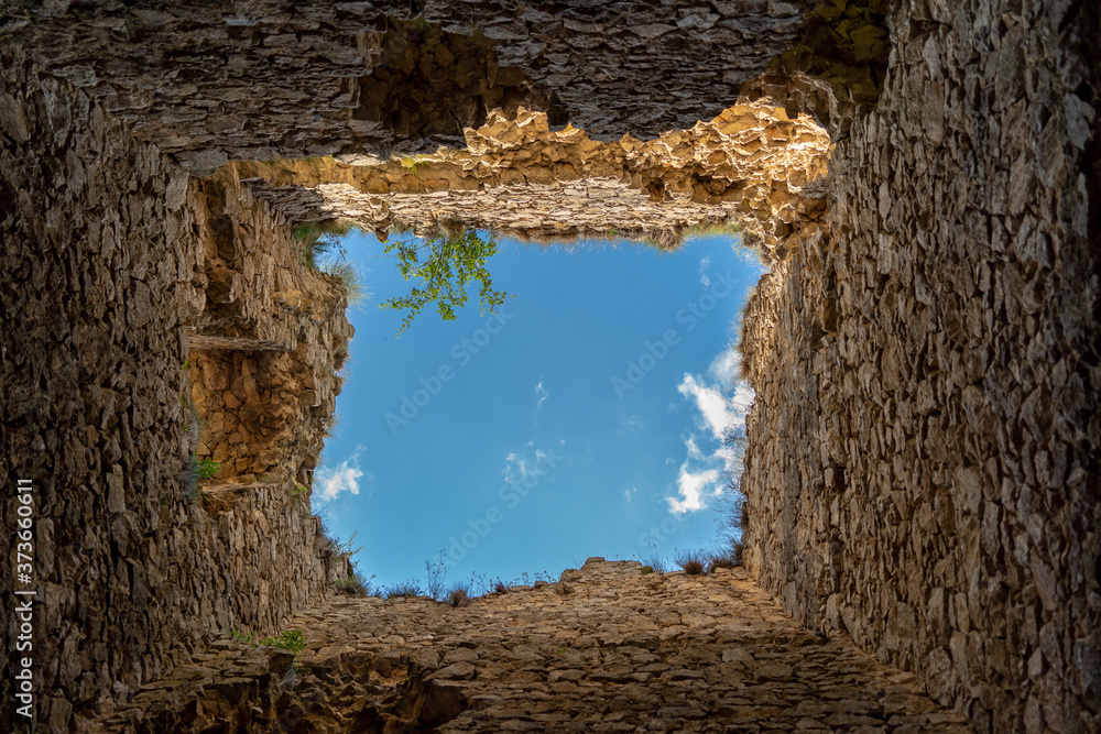 Bottom view of an old fortress, subjective angle of a captive man in a ...