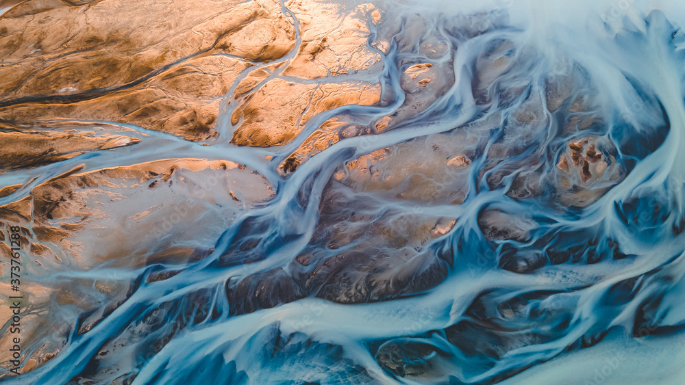 A glacial rivers from above. Aerial photograph of the river streams ...