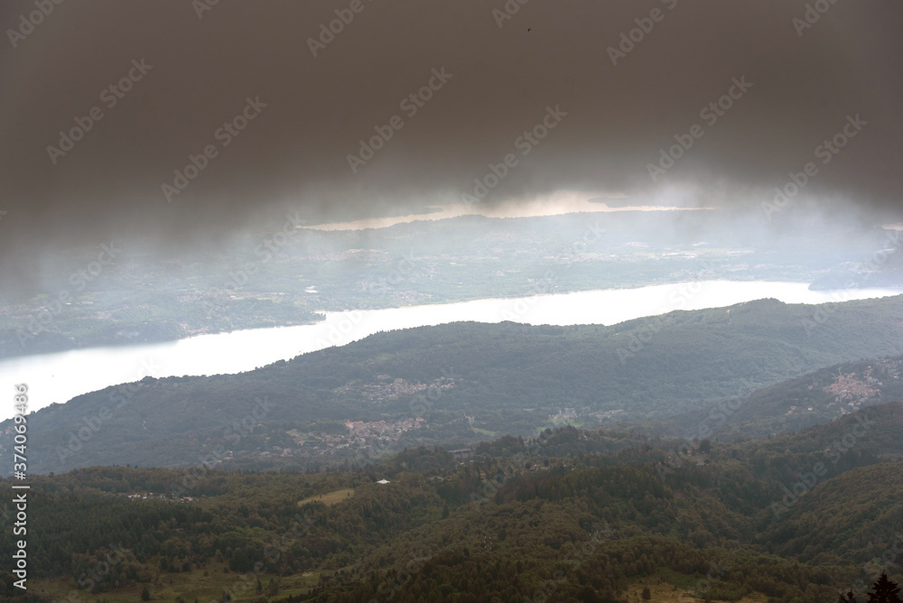storm or a violent state of the atmosphere that hits its surface ...
