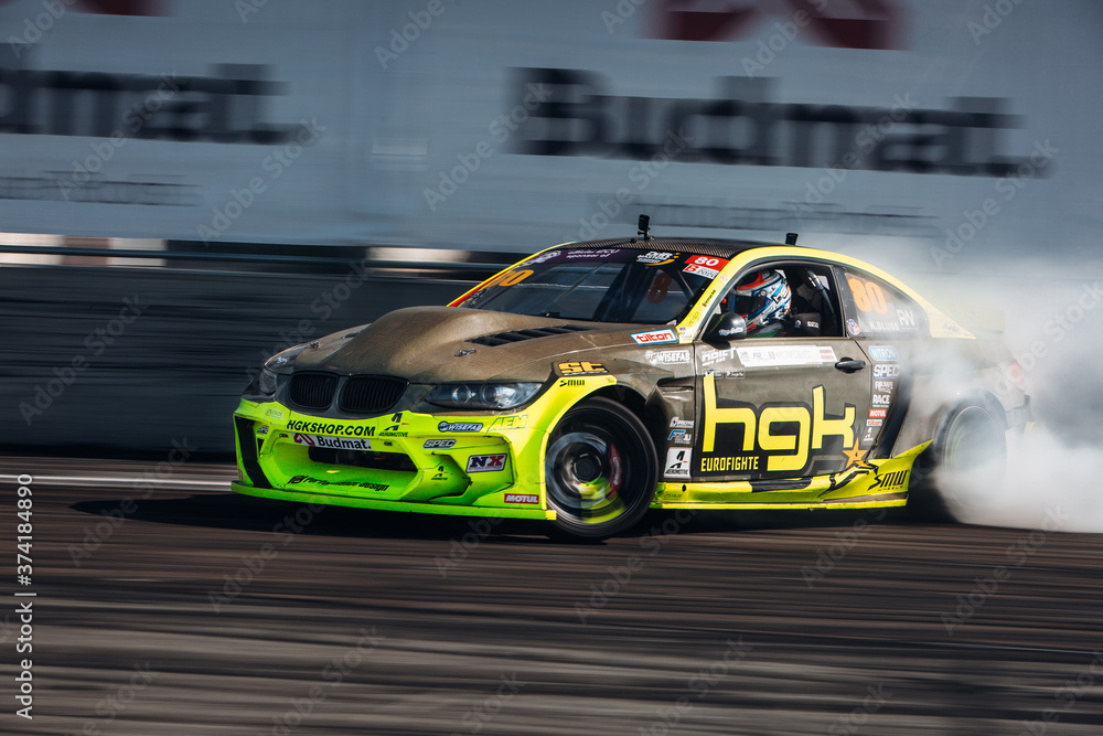 BMW M3 E92 Eurofighter in drift. Car go at the full speed in slide with a lot of smoke Stock ...