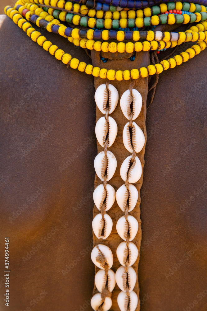 Cowry shells and colourful beads as body decoration (detail), Galeb ...