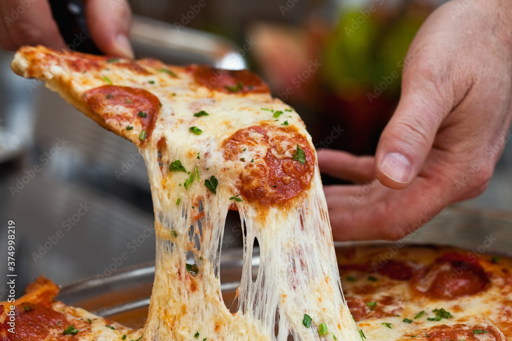 Gooey Pizza Stock Photo | Adobe Stock
