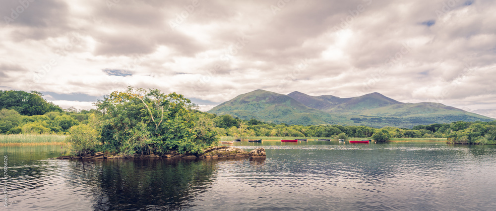 The idyllic Lough Leane and Ross Island at Ross Castle in the Killarney ...