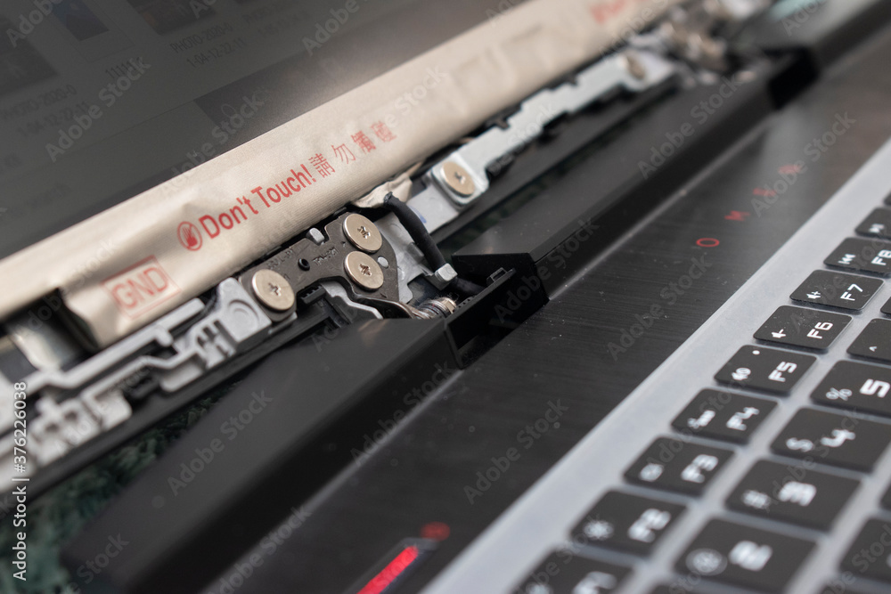 repairing gaming laptop and removing inner parts of gaming laptop ...