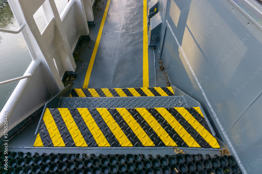 Foto de Stock Safety walkway on ships deck. Yellow line walkway. Guided ...
