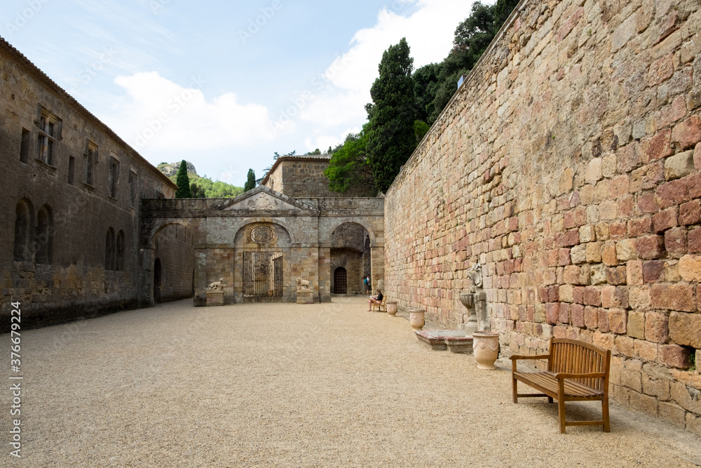 The beautiful backyard with ancient stone architecture and the ...