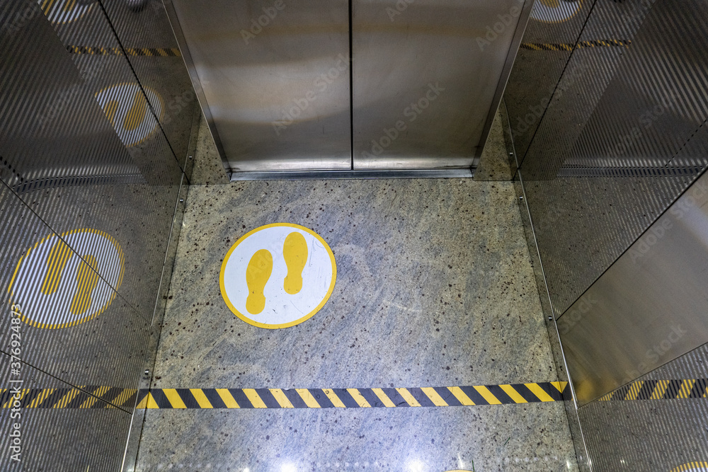 Elevator Social Distancing Signs on corona times Stock Photo | Adobe Stock