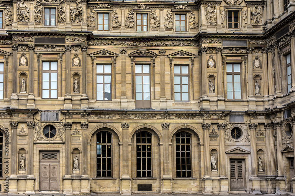 View fragments of Louvre buildings in Square Courtyard (Cour Carree) of ...