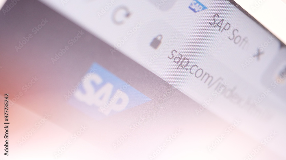 Website of SAP SE in browser and logo on the computer screen. Editorial ...