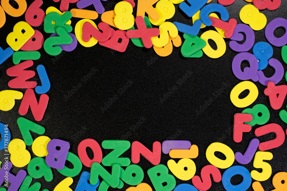 Random multi color alphabets in random position with rectangle frame ...
