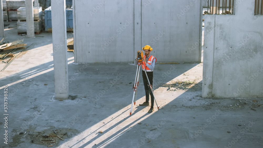 Construction Worker Using Theodolite Surveying Optical Instrument for ...