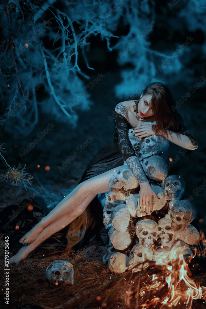 Artwork photo. Portrait of a young beautiful vampire woman. Red lips ...