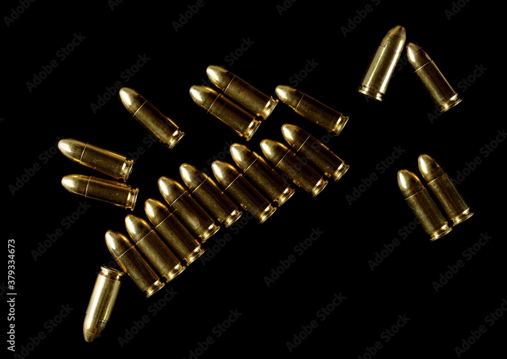 9mm pistol bullets isolated on black background, top view, clipping ...