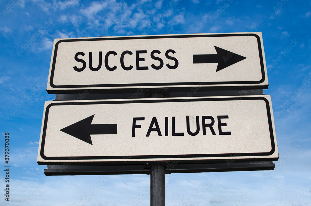 Foto stock di Success vs failure. White two street signs with arrow on ...