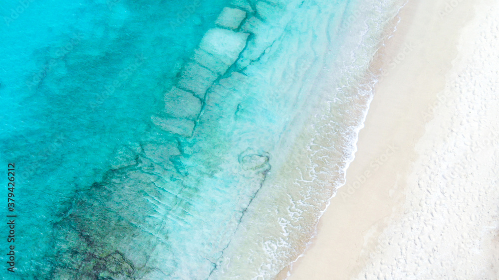 Turquoise water on sandy beach in the Caribbean Stock Photo | Adobe Stock